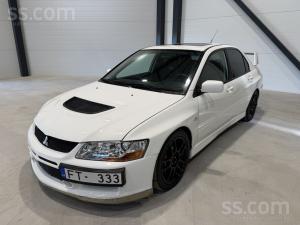 Balts Mitsubishi lancer-evolution 2005 Rīga, ar dzinēja tilpumu 2.00 L un nobraukumu 55 tūkst. km par 36999 €, foto  vietnē AUTOMOTO.COM.LV