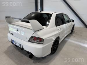 Balts Mitsubishi lancer-evolution 2005 Rīga, ar dzinēja tilpumu 2.00 L un nobraukumu 55 tūkst. km par 36999 €, foto 7 vietnē AUTOMOTO.COM.LV