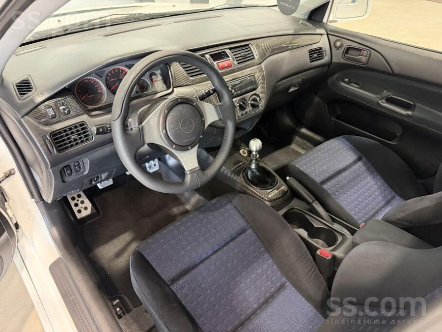 Balts Mitsubishi lancer-evolution 2005 Rīga, ar dzinēja tilpumu 2.00 L un nobraukumu 55 tūkst. km par 36999 €, foto 8 vietnē AUTOMOTO.COM.LV