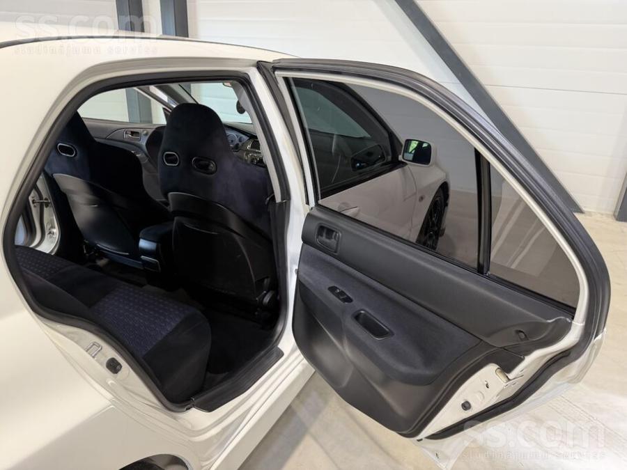 Balts Mitsubishi lancer-evolution 2005 Rīga, ar dzinēja tilpumu 2.00 L un nobraukumu 55 tūkst. km par 36999 €, foto 14 vietnē AUTOMOTO.COM.LV