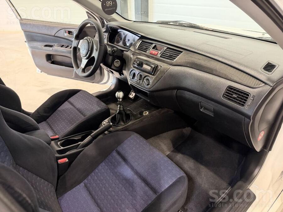 Balts Mitsubishi lancer-evolution 2005 Rīga, ar dzinēja tilpumu 2.00 L un nobraukumu 55 tūkst. km par 36999 €, foto 15 vietnē AUTOMOTO.COM.LV