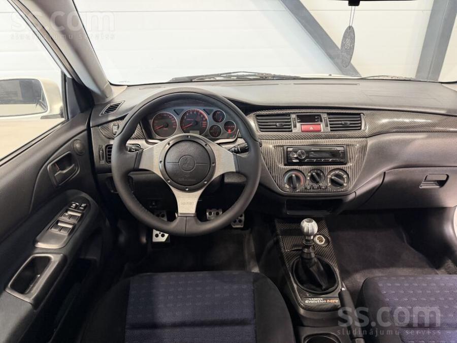 Balts Mitsubishi lancer-evolution 2005 Rīga, ar dzinēja tilpumu 2.00 L un nobraukumu 55 tūkst. km par 36999 €, foto 17 vietnē AUTOMOTO.COM.LV