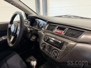 Balts Mitsubishi lancer-evolution 2005 Rīga, ar dzinēja tilpumu 2.00 L un nobraukumu 55 tūkst. km par 36999 €, foto 18 vietnē AUTOMOTO.COM.LV