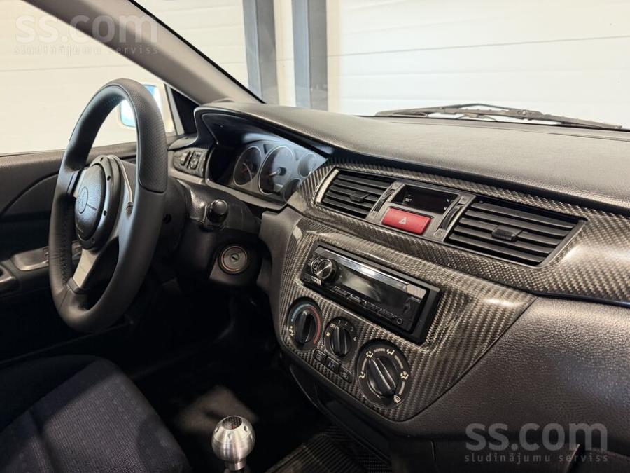 Balts Mitsubishi lancer-evolution 2005 Rīga, ar dzinēja tilpumu 2.00 L un nobraukumu 55 tūkst. km par 36999 €, foto 18 vietnē AUTOMOTO.COM.LV