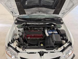 Balts Mitsubishi lancer-evolution 2005 Rīga, ar dzinēja tilpumu 2.00 L un nobraukumu 55 tūkst. km par 36999 €, foto 19 vietnē AUTOMOTO.COM.LV