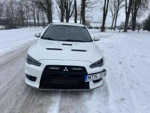 Balts Mitsubishi lancer-evolution 2008 Kauņa, ar dzinēja tilpumu 2.00 L un nobraukumu 196 tūkst. km par 29500 €, foto 2 vietnē AUTOMOTO.COM.LV
