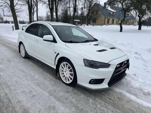 White Mitsubishi lancer-evolution 2008 in Kaunas, with an engine capacity of 2.00 L and mileage of 196 thousand km for 29500 €, photo 3 on AUTOMOTO.COM.LV