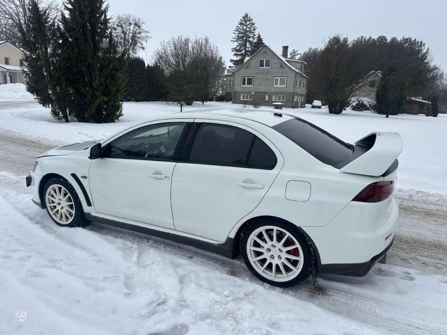 Balts Mitsubishi lancer-evolution 2008 Kauņa, ar dzinēja tilpumu 2.00 L un nobraukumu 196 tūkst. km par 29500 €, foto 5 vietnē AUTOMOTO.COM.LV