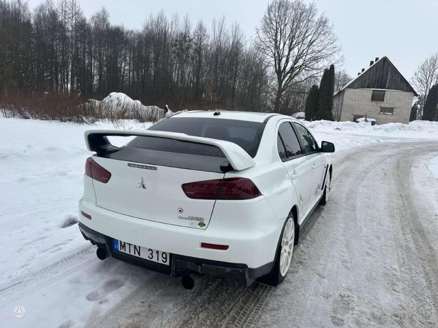 Balts Mitsubishi lancer-evolution 2008 Kauņa, ar dzinēja tilpumu 2.00 L un nobraukumu 196 tūkst. km par 29500 €, foto 8 vietnē AUTOMOTO.COM.LV