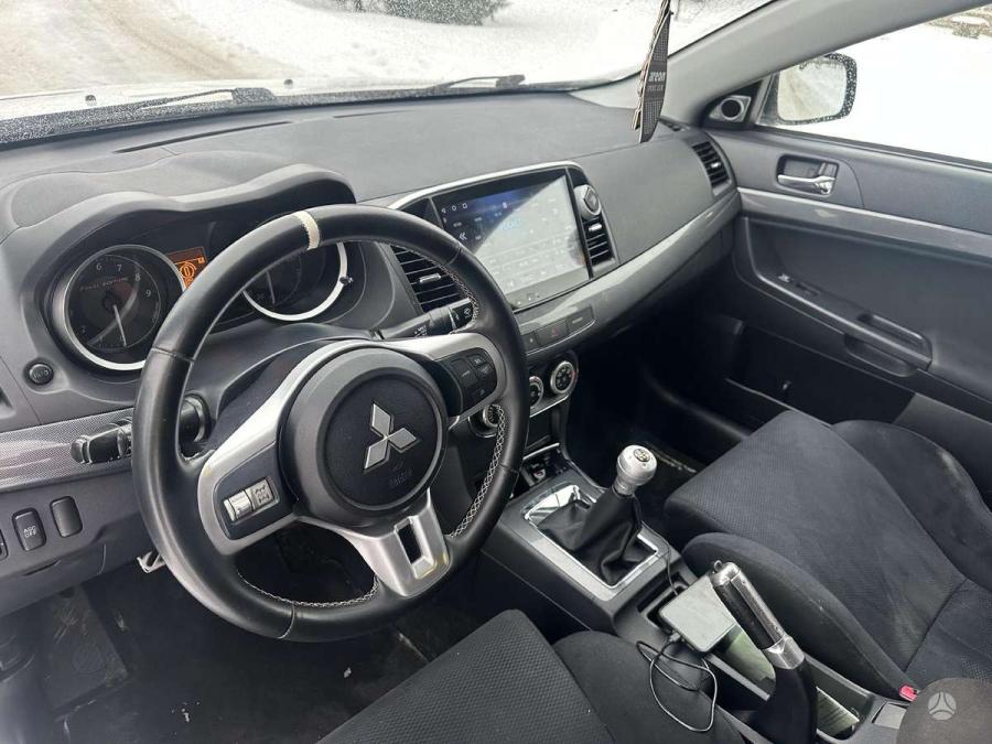 Balts Mitsubishi lancer-evolution 2008 Kauņa, ar dzinēja tilpumu 2.00 L un nobraukumu 196 tūkst. km par 29500 €, foto 9 vietnē AUTOMOTO.COM.LV