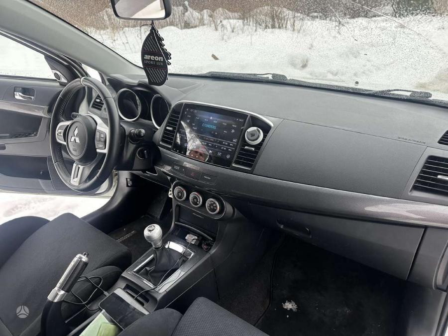 Balts Mitsubishi lancer-evolution 2008 Kauņa, ar dzinēja tilpumu 2.00 L un nobraukumu 196 tūkst. km par 29500 €, foto 15 vietnē AUTOMOTO.COM.LV
