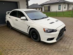 Balts Mitsubishi lancer-evolution 2010 Tartu, ar dzinēja tilpumu 2.00 L un nobraukumu 186 tūkst. km par 34999 €, foto 3 vietnē AUTOMOTO.COM.LV