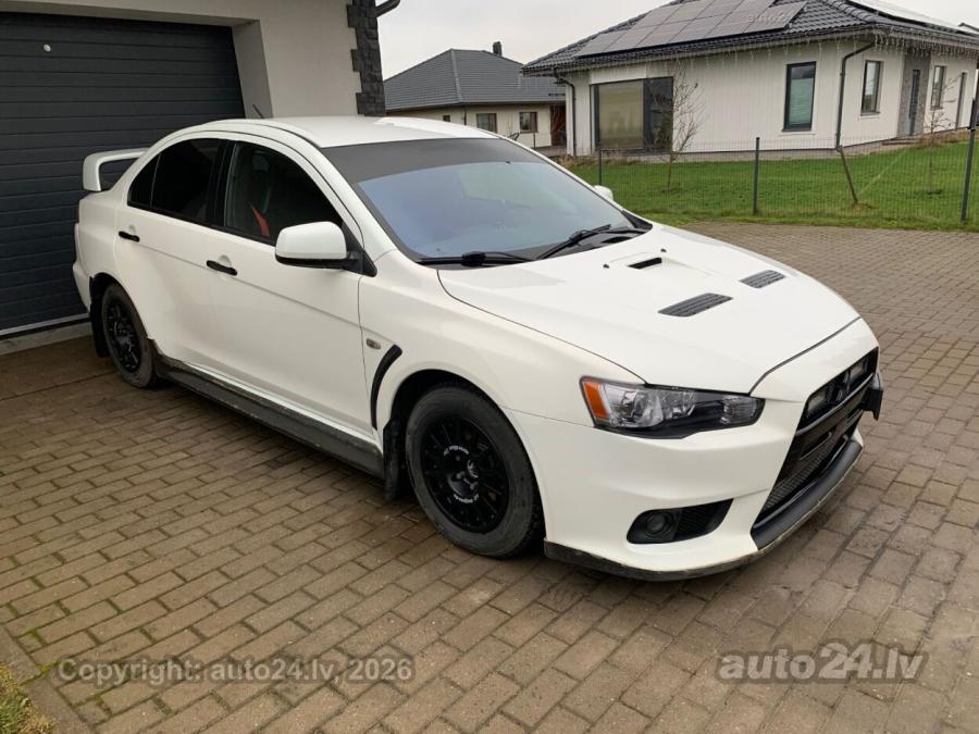 Balts Mitsubishi lancer-evolution 2010 Tartu, ar dzinēja tilpumu 2.00 L un nobraukumu 186 tūkst. km par 34999 €, foto 3 vietnē AUTOMOTO.COM.LV
