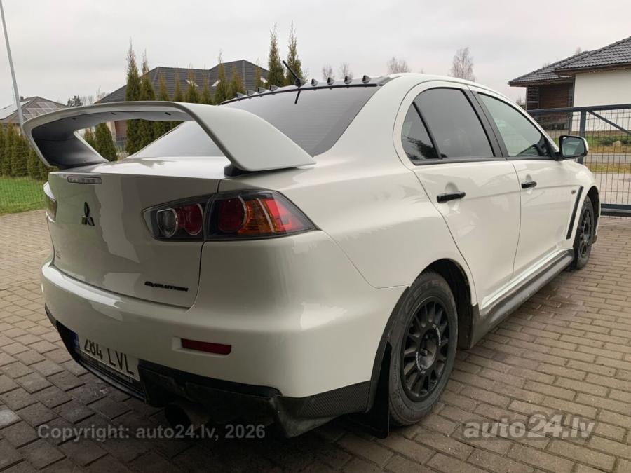Balts Mitsubishi lancer-evolution 2010 Tartu, ar dzinēja tilpumu 2.00 L un nobraukumu 186 tūkst. km par 34999 €, foto 6 vietnē AUTOMOTO.COM.LV