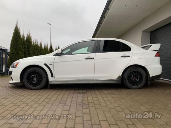 Balts Mitsubishi lancer-evolution 2010 Tartu, ar dzinēja tilpumu 2.00 L un nobraukumu 186 tūkst. km par 34999 €, foto 7 vietnē AUTOMOTO.COM.LV