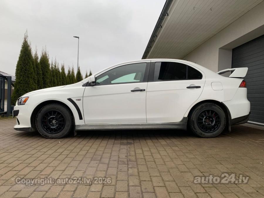 Balts Mitsubishi lancer-evolution 2010 Tartu, ar dzinēja tilpumu 2.00 L un nobraukumu 186 tūkst. km par 34999 €, foto 7 vietnē AUTOMOTO.COM.LV