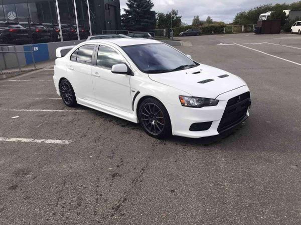 White Mitsubishi lancer-evolution 2010 in Vilnius, with an engine capacity of 2.00 L and mileage of 152 thousand km for 21000 €, photo 1 on AUTOMOTO.COM.LV