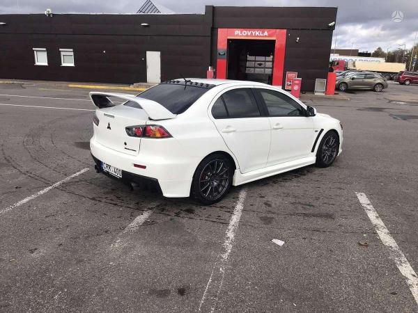 White Mitsubishi lancer-evolution 2010 in Vilnius, with an engine capacity of 2.00 L and mileage of 152 thousand km for 21000 €, photo 2 on AUTOMOTO.COM.LV