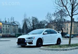 Balts Mitsubishi lancer-evolution 2010 Rīga, ar dzinēja tilpumu 2.00 L un nobraukumu 122 tūkst. km par 23499 €, foto 5 vietnē AUTOMOTO.COM.LV