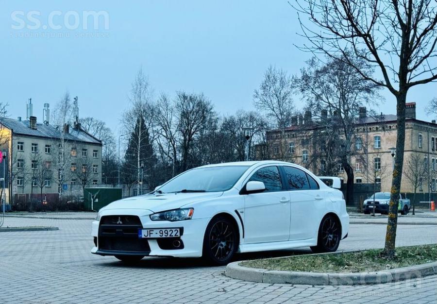 Balts Mitsubishi lancer-evolution 2010 Rīga, ar dzinēja tilpumu 2.00 L un nobraukumu 122 tūkst. km par 23499 €, foto 5 vietnē AUTOMOTO.COM.LV