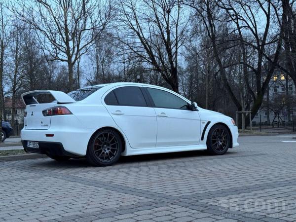 Balts Mitsubishi lancer-evolution 2010 Rīga, ar dzinēja tilpumu 2.00 L un nobraukumu 122 tūkst. km par 23499 €, foto 5 vietnē AUTOMOTO.COM.LV