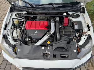 Balts Mitsubishi lancer-evolution 2010 Rīga, ar dzinēja tilpumu 2.00 L un nobraukumu 122 tūkst. km par 23499 €, foto 8 vietnē AUTOMOTO.COM.LV