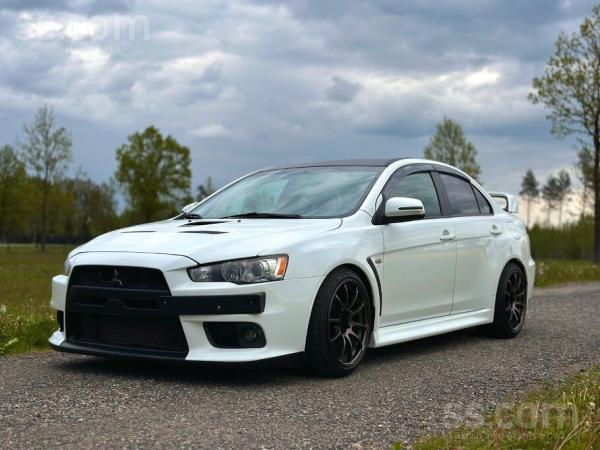 Balts Mitsubishi lancer-evolution 2011 Ogre, ar dzinēja tilpumu 2.00 L un nobraukumu 64 tūkst. km par 24500 €, foto 3 vietnē AUTOMOTO.COM.LV