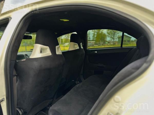 Balts Mitsubishi lancer-evolution 2011 Ogre, ar dzinēja tilpumu 2.00 L un nobraukumu 64 tūkst. km par 24500 €, foto 9 vietnē AUTOMOTO.COM.LV