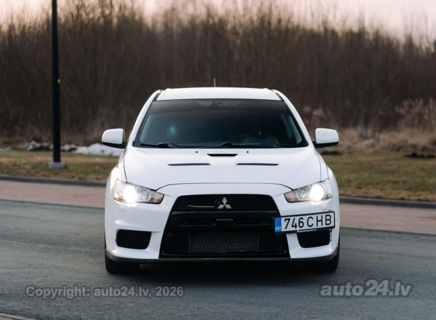 Balts Mitsubishi lancer-evolution 2012 Tallina, ar dzinēja tilpumu 2.00 L un nobraukumu 127 tūkst. km par 42900 €, foto 2 vietnē AUTOMOTO.COM.LV