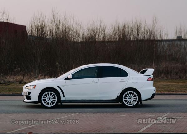 White Mitsubishi lancer-evolution 2012 in Tallinn, with an engine capacity of 2.00 L and mileage of 127 thousand km for 42900 €, photo 4 on AUTOMOTO.COM.LV
