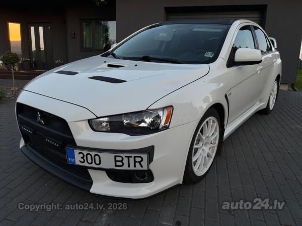 Balts Mitsubishi lancer-evolution 2014 Tallina, ar dzinēja tilpumu 2.00 L un nobraukumu 103 tūkst. km par 31500 €, foto 1 vietnē AUTOMOTO.COM.LV