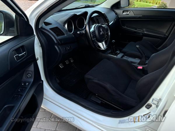 Balts Mitsubishi lancer-evolution 2014 Tallina, ar dzinēja tilpumu 2.00 L un nobraukumu 103 tūkst. km par 31500 €, foto 5 vietnē AUTOMOTO.COM.LV