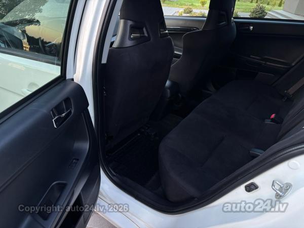 Balts Mitsubishi lancer-evolution 2014 Tallina, ar dzinēja tilpumu 2.00 L un nobraukumu 103 tūkst. km par 31500 €, foto 7 vietnē AUTOMOTO.COM.LV