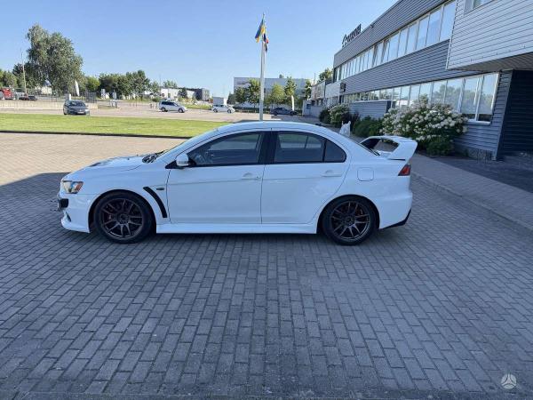 Balts Mitsubishi lancer-evolution 2015 Kauņa, ar dzinēja tilpumu 2.00 L un nobraukumu 240 tūkst. km par 25500 €, foto 6 vietnē AUTOMOTO.COM.LV