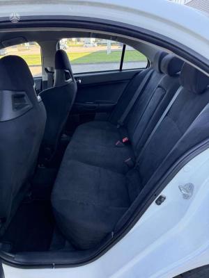 White Mitsubishi lancer-evolution 2015 in Kaunas, with an engine capacity of 2.00 L and mileage of 240 thousand km for 25500 €, photo 8 on AUTOMOTO.COM.LV