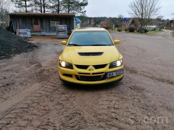 Yellow Mitsubishi lancer-evolution 2003 in Valmiera, with an engine capacity of 2.00 L and mileage of 106 thousand km for 23000 €, photo 3 on AUTOMOTO.COM.LV