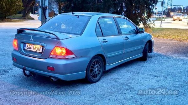 Green Mitsubishi Lancer 2006 in Tallinn, with an engine capacity of 1.60 L and mileage of 270 thousand km for 1800 €, photo 2 on AUTOMOTO.COM.LV