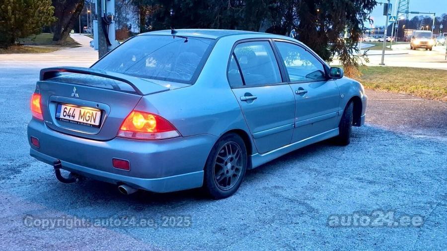 Green Mitsubishi Lancer 2006 in Tallinn, with an engine capacity of 1.60 L and mileage of 270 thousand km for 1800 €, photo 2 on AUTOMOTO.COM.LV
