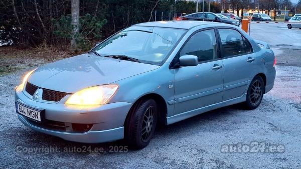Green Mitsubishi Lancer 2006 in Tallinn, with an engine capacity of 1.60 L and mileage of 270 thousand km for 1800 €, photo 3 on AUTOMOTO.COM.LV