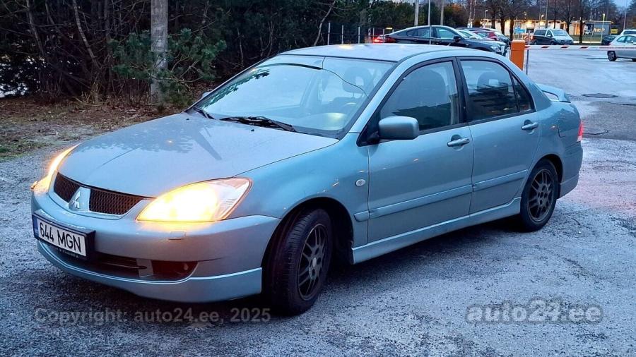 Green Mitsubishi Lancer 2006 in Tallinn, with an engine capacity of 1.60 L and mileage of 270 thousand km for 1800 €, photo 3 on AUTOMOTO.COM.LV