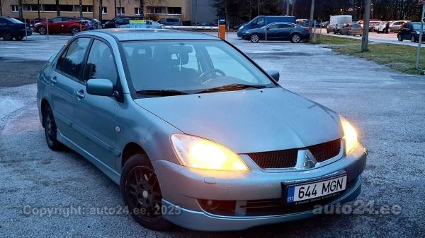 Green Mitsubishi Lancer 2006 in Tallinn, with an engine capacity of 1.60 L and mileage of 270 thousand km for 1800 €, photo 4 on AUTOMOTO.COM.LV