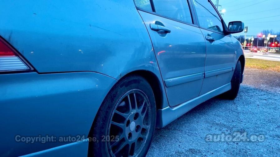 Green Mitsubishi Lancer 2006 in Tallinn, with an engine capacity of 1.60 L and mileage of 270 thousand km for 1800 €, photo 5 on AUTOMOTO.COM.LV
