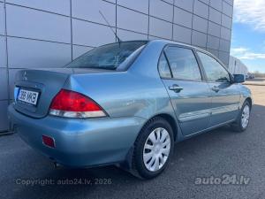 Green Mitsubishi Lancer 2007 in Kuressaare, with an engine capacity of 1.30 L and mileage of 192 thousand km for 1250 €, photo 6 on AUTOMOTO.COM.LV