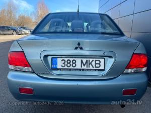 Zaļš Mitsubishi Lancer 2007 Kuresāre, ar dzinēja tilpumu 1.30 L un nobraukumu 192 tūkst. km par 1250 €, foto 5 vietnē AUTOMOTO.COM.LV
