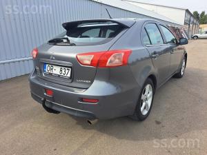 Pelēks Mitsubishi Lancer 2011 Jēkabpils, ar dzinēja tilpumu 1.80 L un nobraukumu 284 tūkst. km par 2800 €, foto 5 vietnē AUTOMOTO.COM.LV