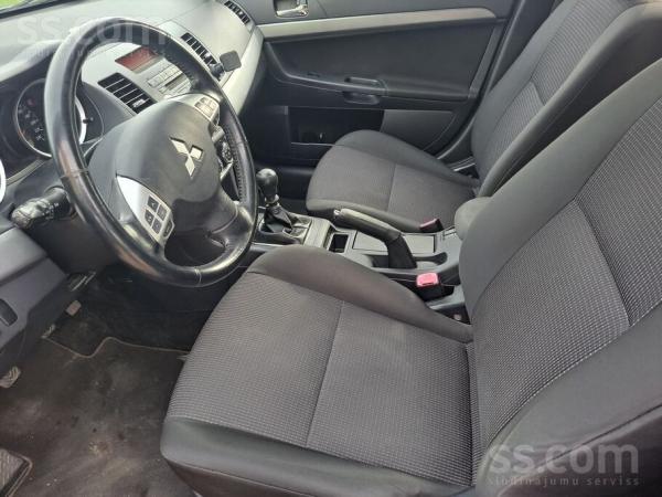 Pelēks Mitsubishi Lancer 2011 Jēkabpils, ar dzinēja tilpumu 1.80 L un nobraukumu 284 tūkst. km par 2800 €, foto 10 vietnē AUTOMOTO.COM.LV