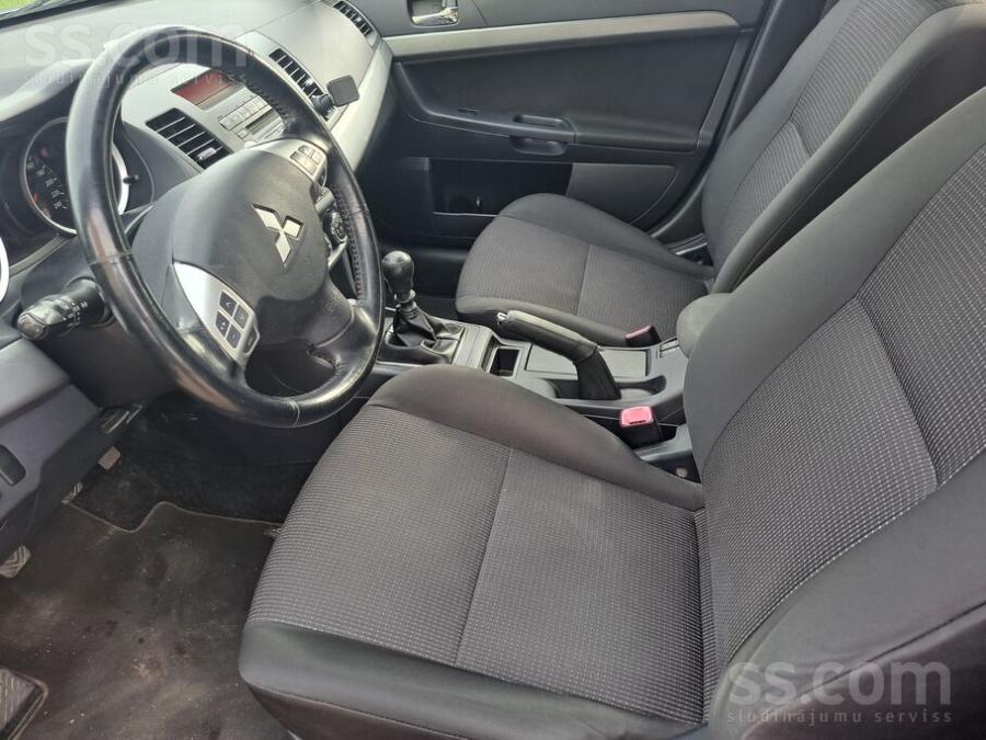 Pelēks Mitsubishi Lancer 2011 Jēkabpils, ar dzinēja tilpumu 1.80 L un nobraukumu 284 tūkst. km par 2800 €, foto 10 vietnē AUTOMOTO.COM.LV