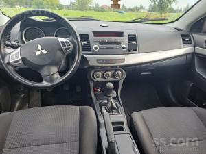 Pelēks Mitsubishi Lancer 2011 Jēkabpils, ar dzinēja tilpumu 1.80 L un nobraukumu 284 tūkst. km par 2800 €, foto 11 vietnē AUTOMOTO.COM.LV
