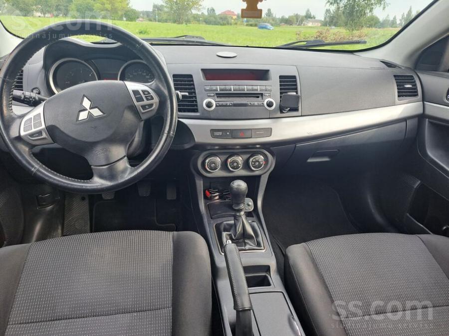Pelēks Mitsubishi Lancer 2011 Jēkabpils, ar dzinēja tilpumu 1.80 L un nobraukumu 284 tūkst. km par 2800 €, foto 11 vietnē AUTOMOTO.COM.LV