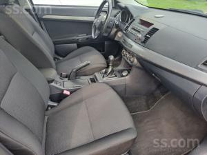 Pelēks Mitsubishi Lancer 2011 Jēkabpils, ar dzinēja tilpumu 1.80 L un nobraukumu 284 tūkst. km par 2800 €, foto 12 vietnē AUTOMOTO.COM.LV